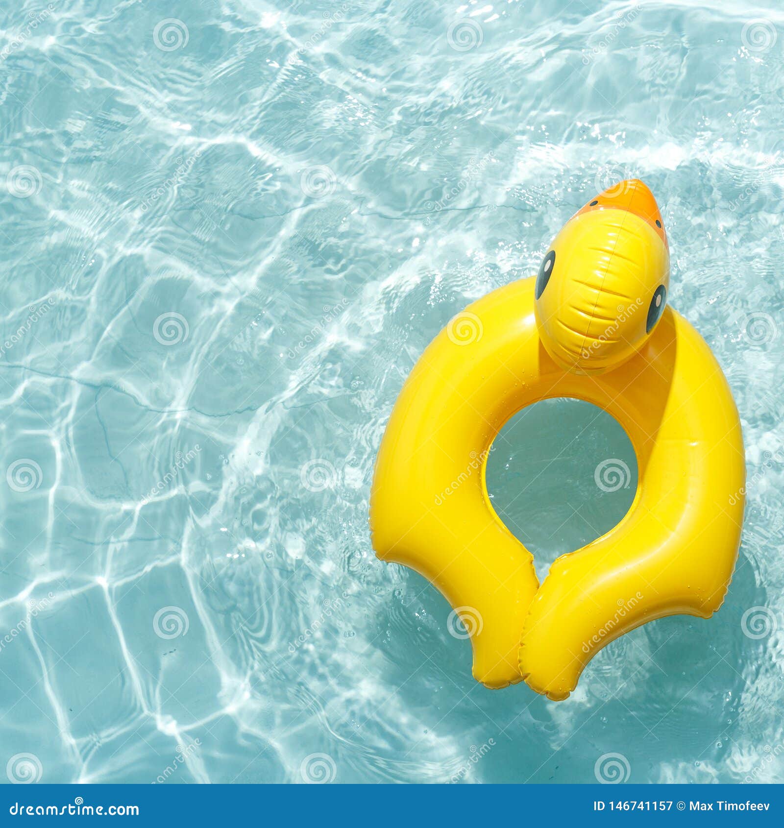 Inflatable Float Rubber Ring in the Shape of a Yellow Duckling in Blue ...