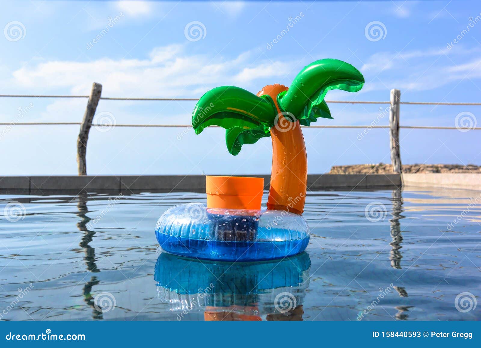 Inflatable Palm Tree Drinks Holder Stock Image - Image of orange ...
