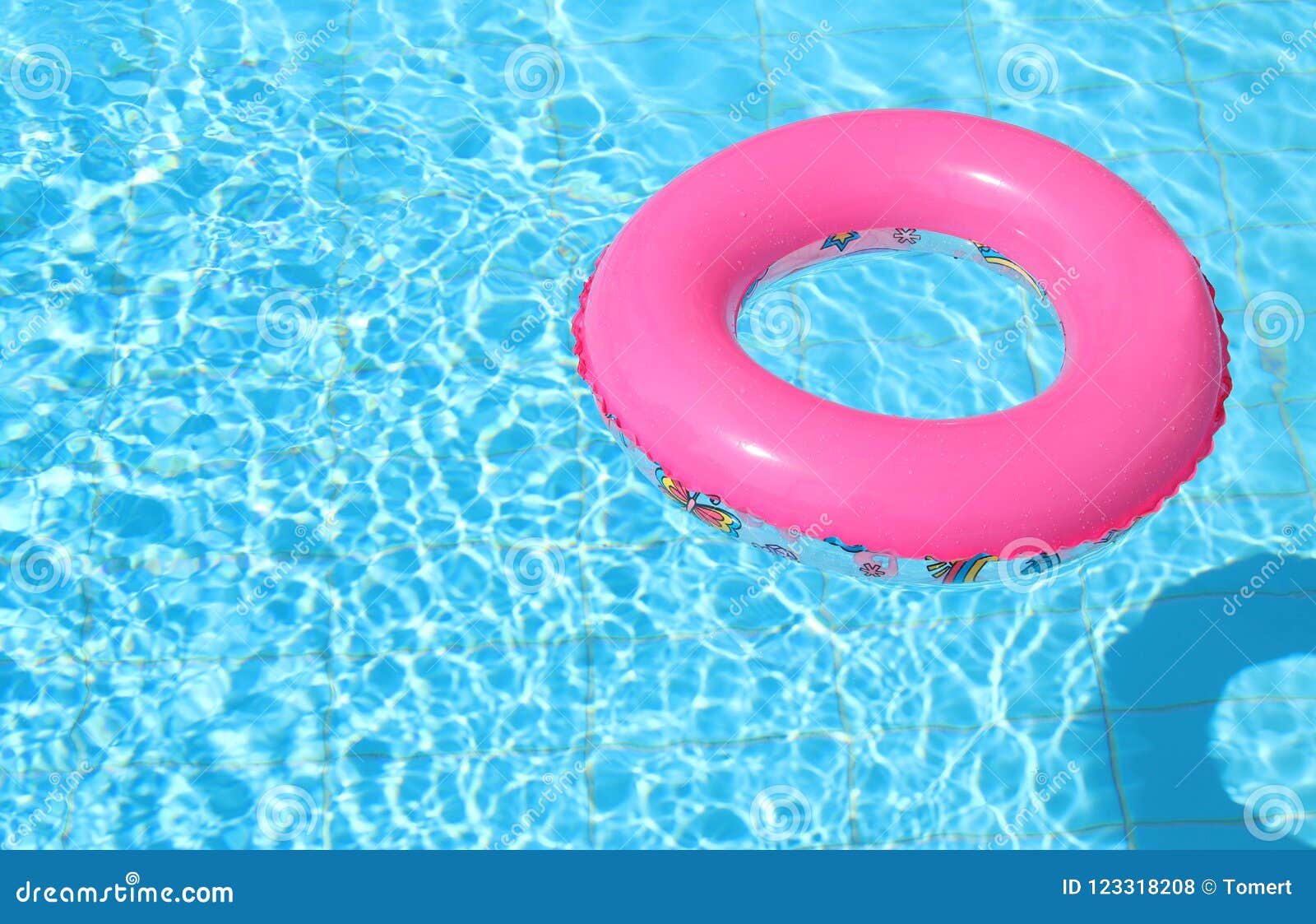 Inflatable Pink Ring in Swimming Pool. Stock Photo - Image of poolside ...