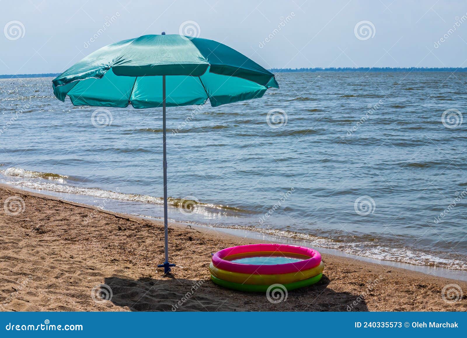 Inflatable Pool on the Beach with Umbrella Stock Image - Image of ...