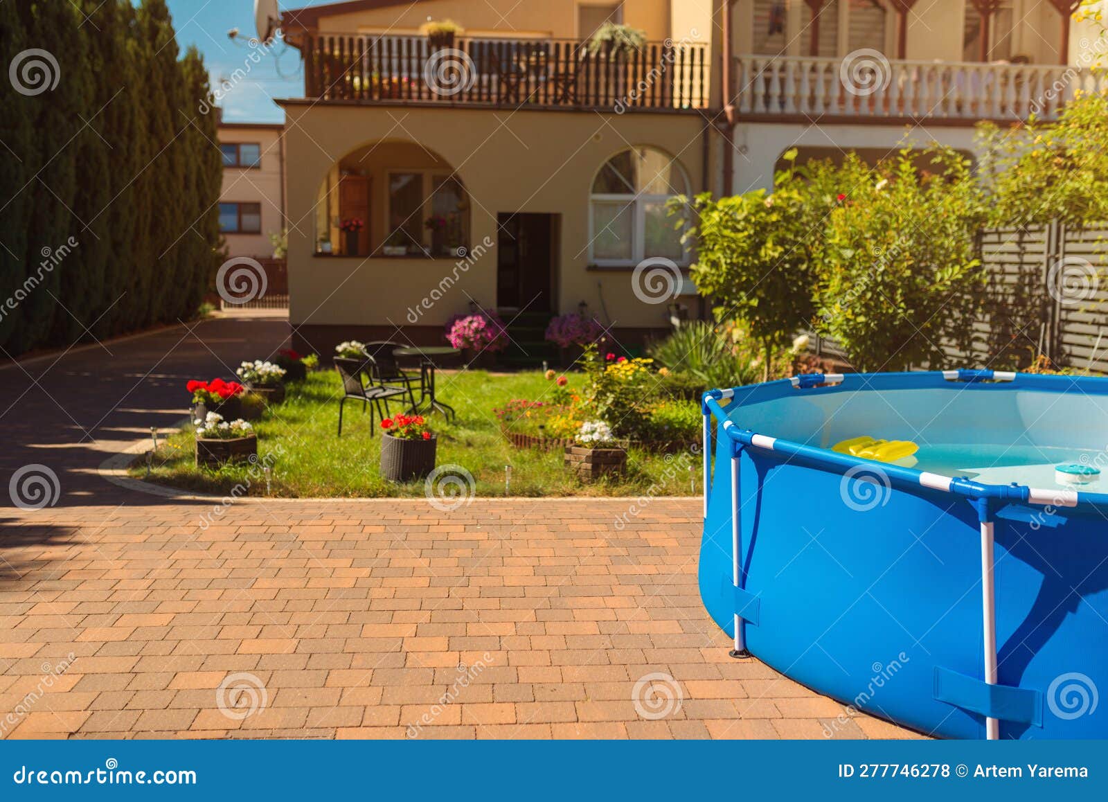 An Inflatable Pool Stands in the Yard Stock Photo - Image of ...