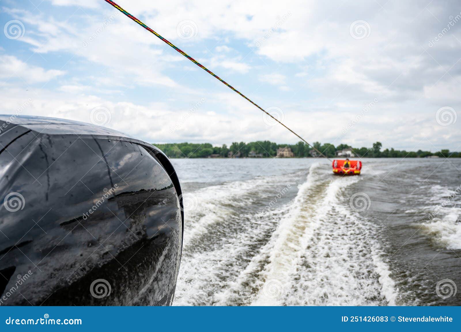 Inflatable Raft Being Pulled at a High Speed by a Boat in a ...
