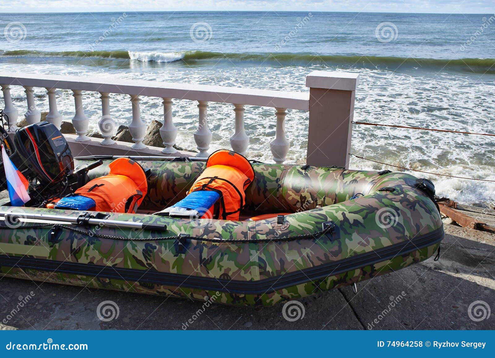 Inflatable Rescue Boat. Gray Inflatable Boat On The Beach In The ...