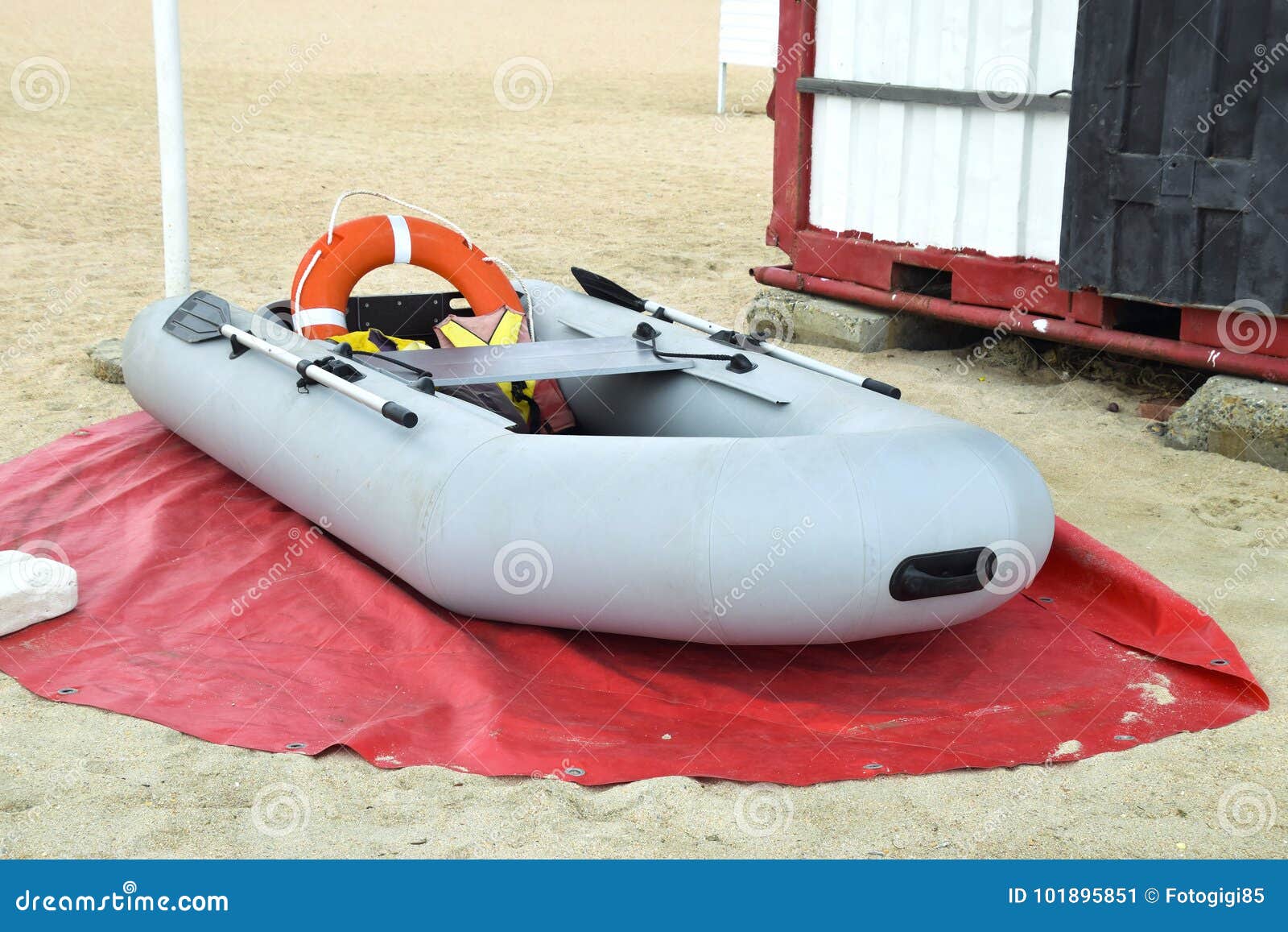 Inflatable Rescue Boat. Gray Inflatable Boat On The Beach In The ...