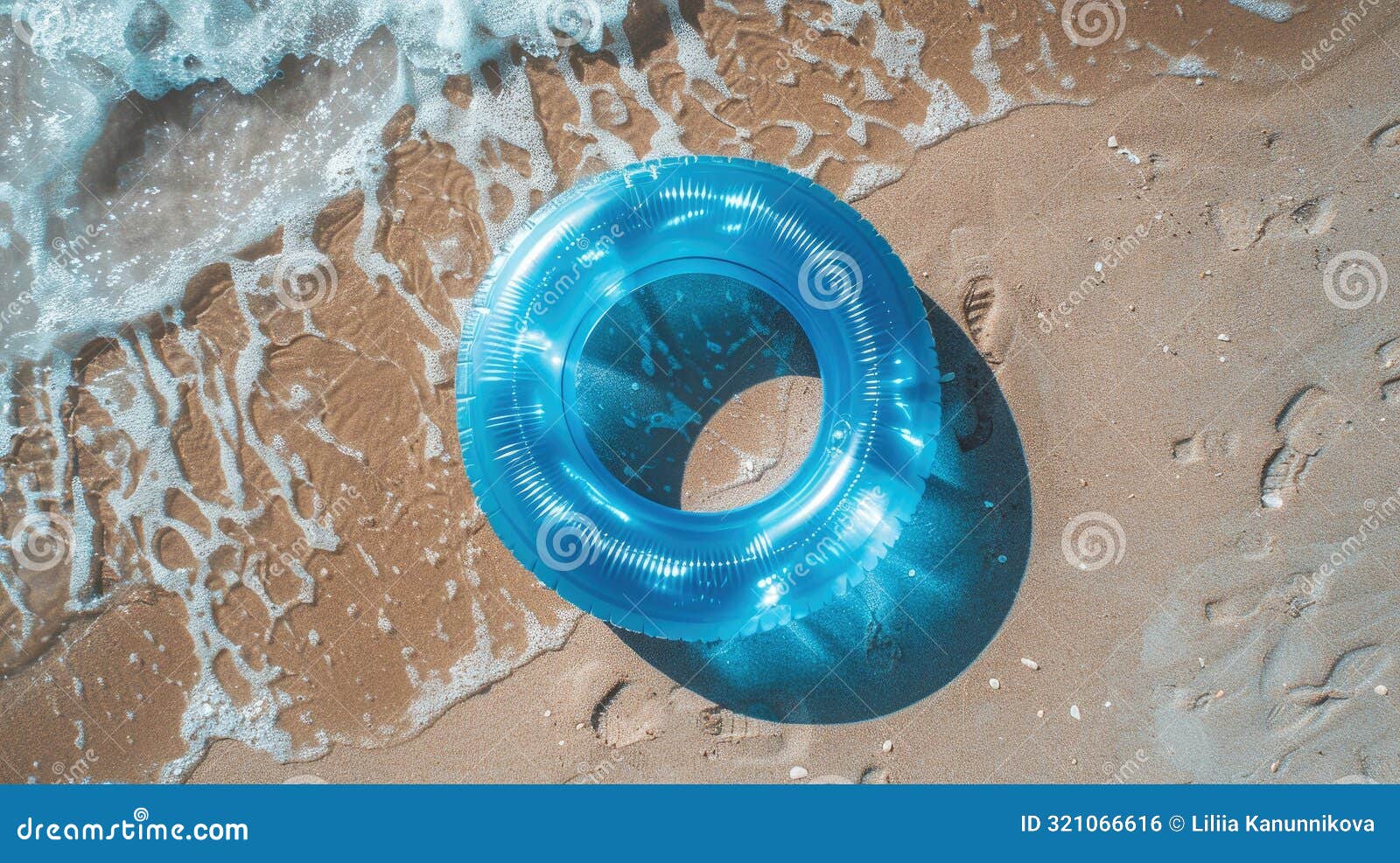 An Inflatable Ring on the Beach, with Waves and Sand Depicted, the ...