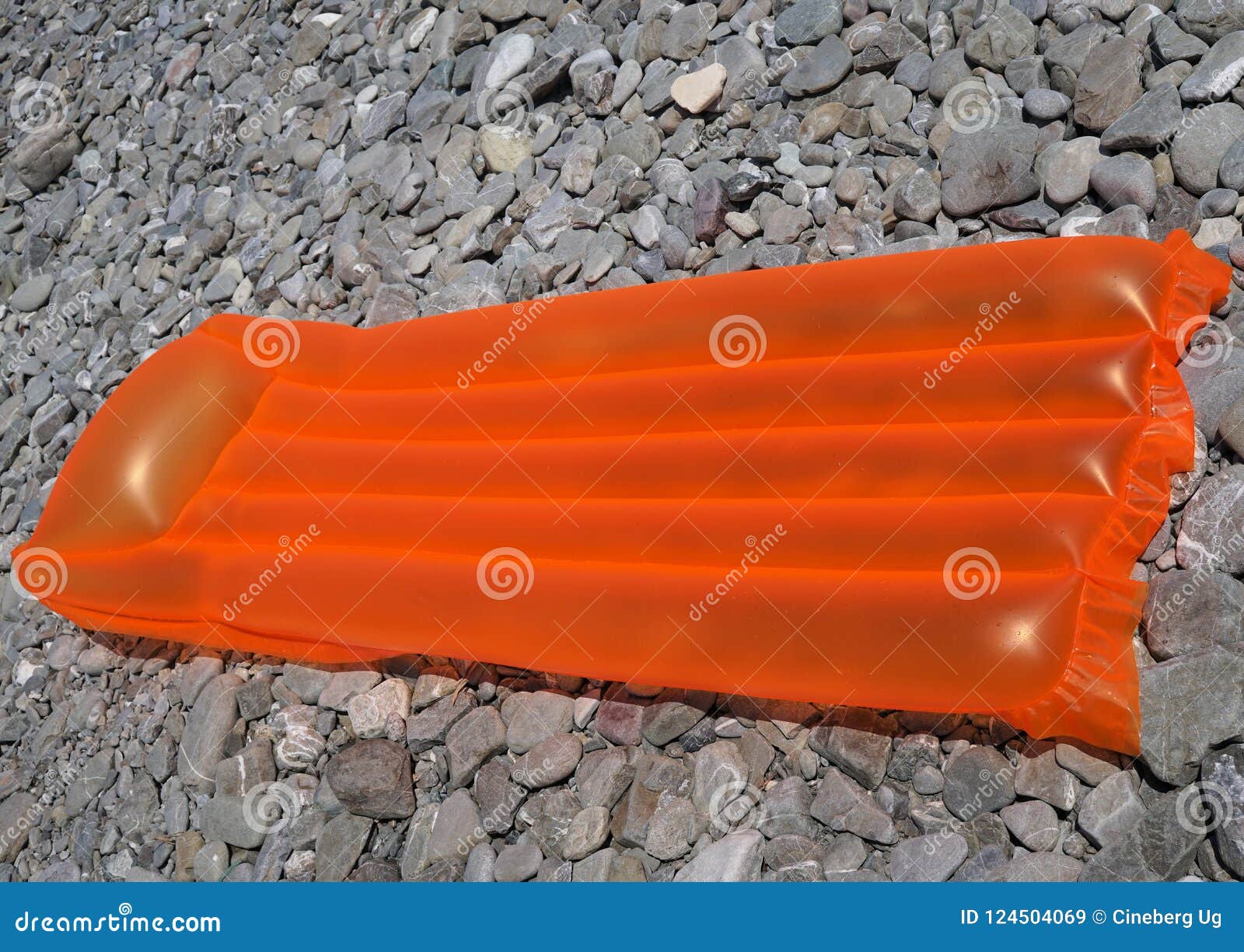Inflatable Sea Mattress on a Stone Beach Stock Image - Image of float ...