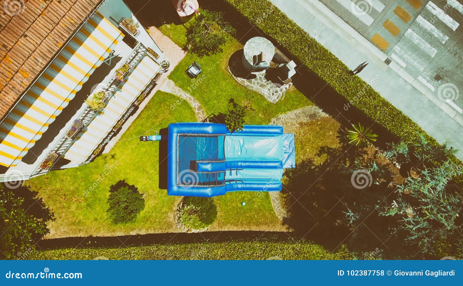 Inflatable Slide in the Gerden Aerial View Stock Photo - Image of house ...