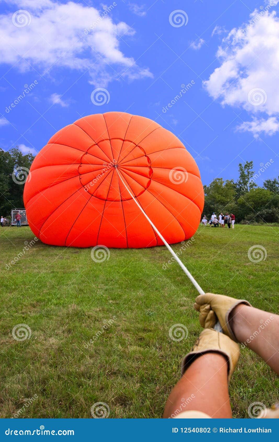 Inflating a Hot Air Balloon Stock Photo - Image of launching, orange ...