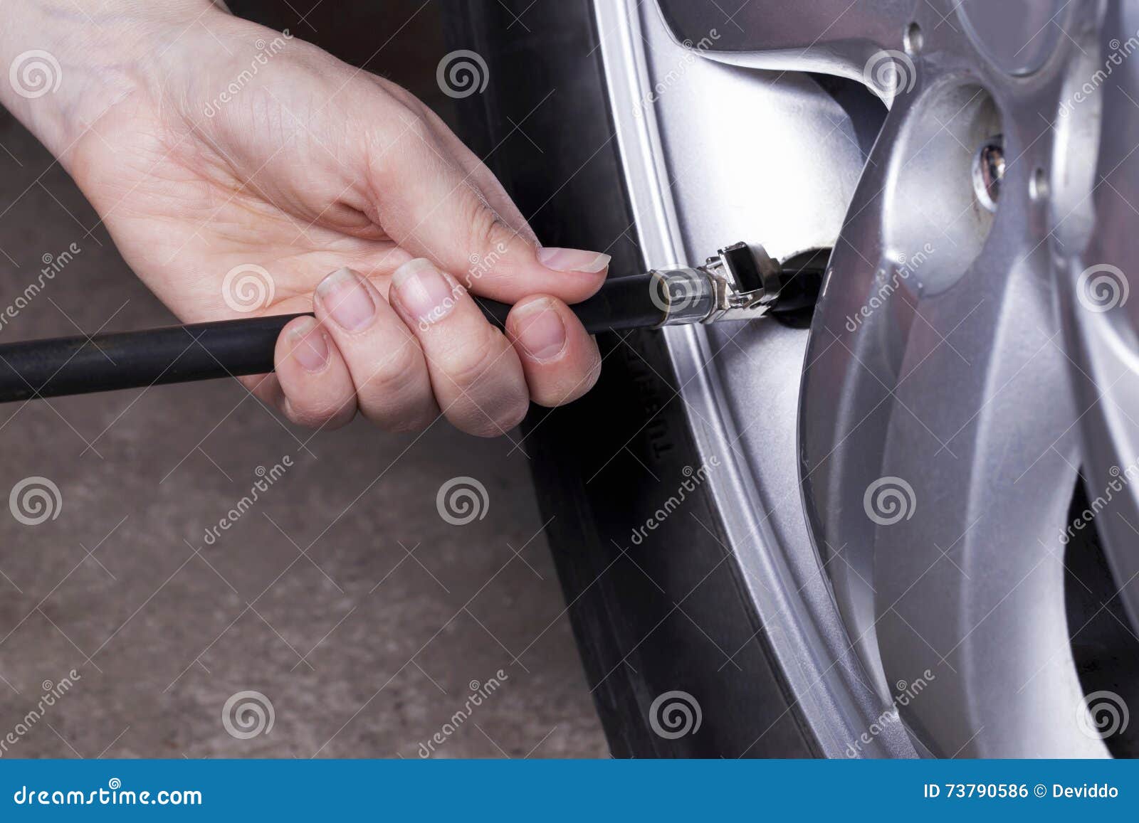 Inflating the wheels stock photo. Image of instrument - 73790586