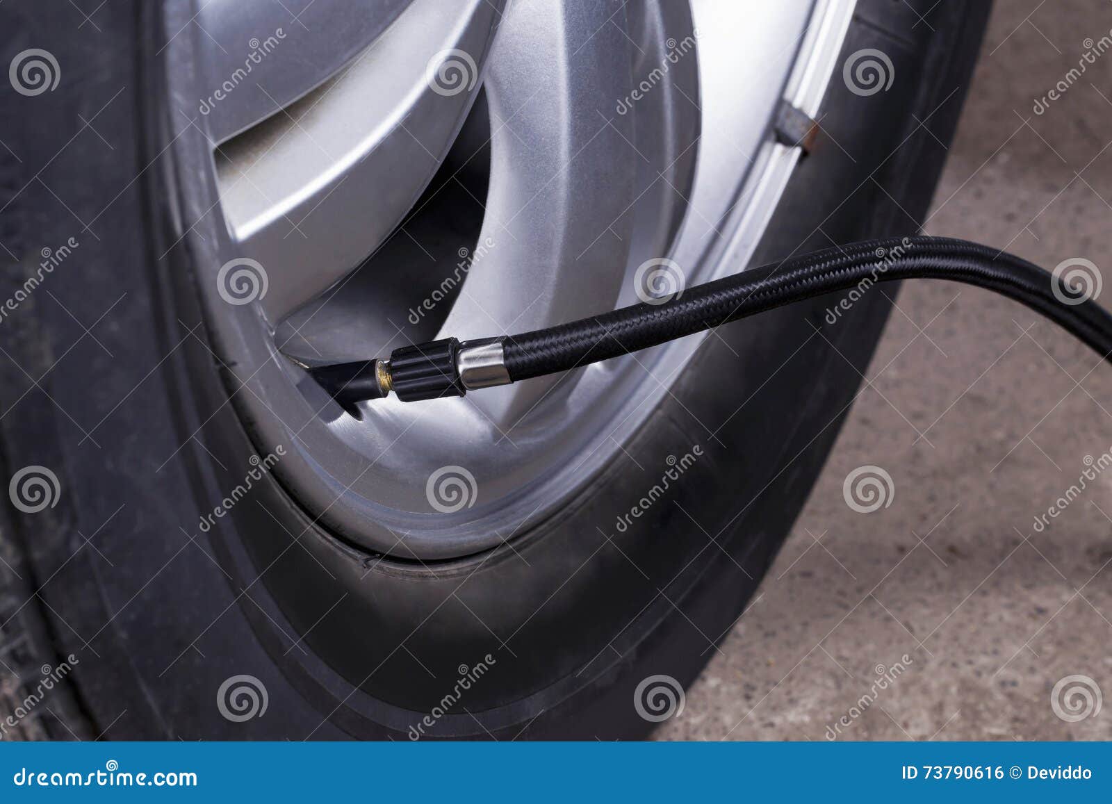 Inflating the wheels stock photo. Image of preparation - 73790616