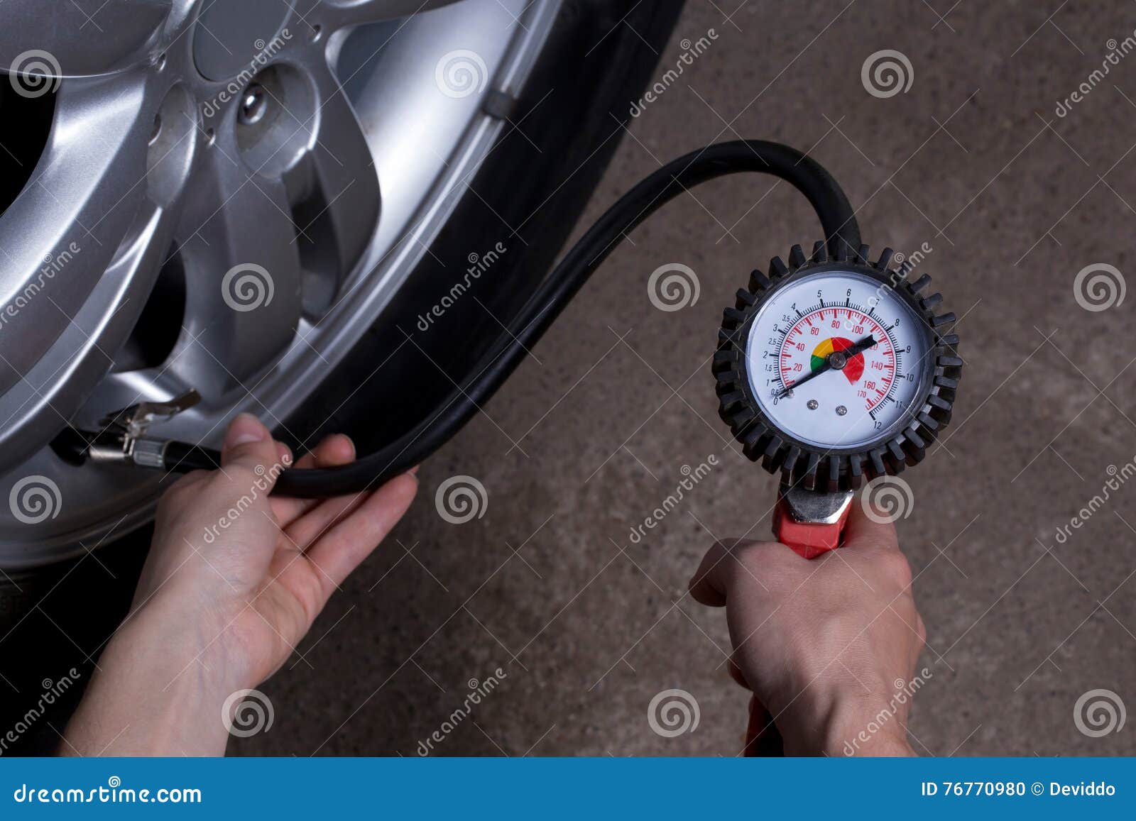 Inflating The Wheels Stock Photo | CartoonDealer.com #73790616