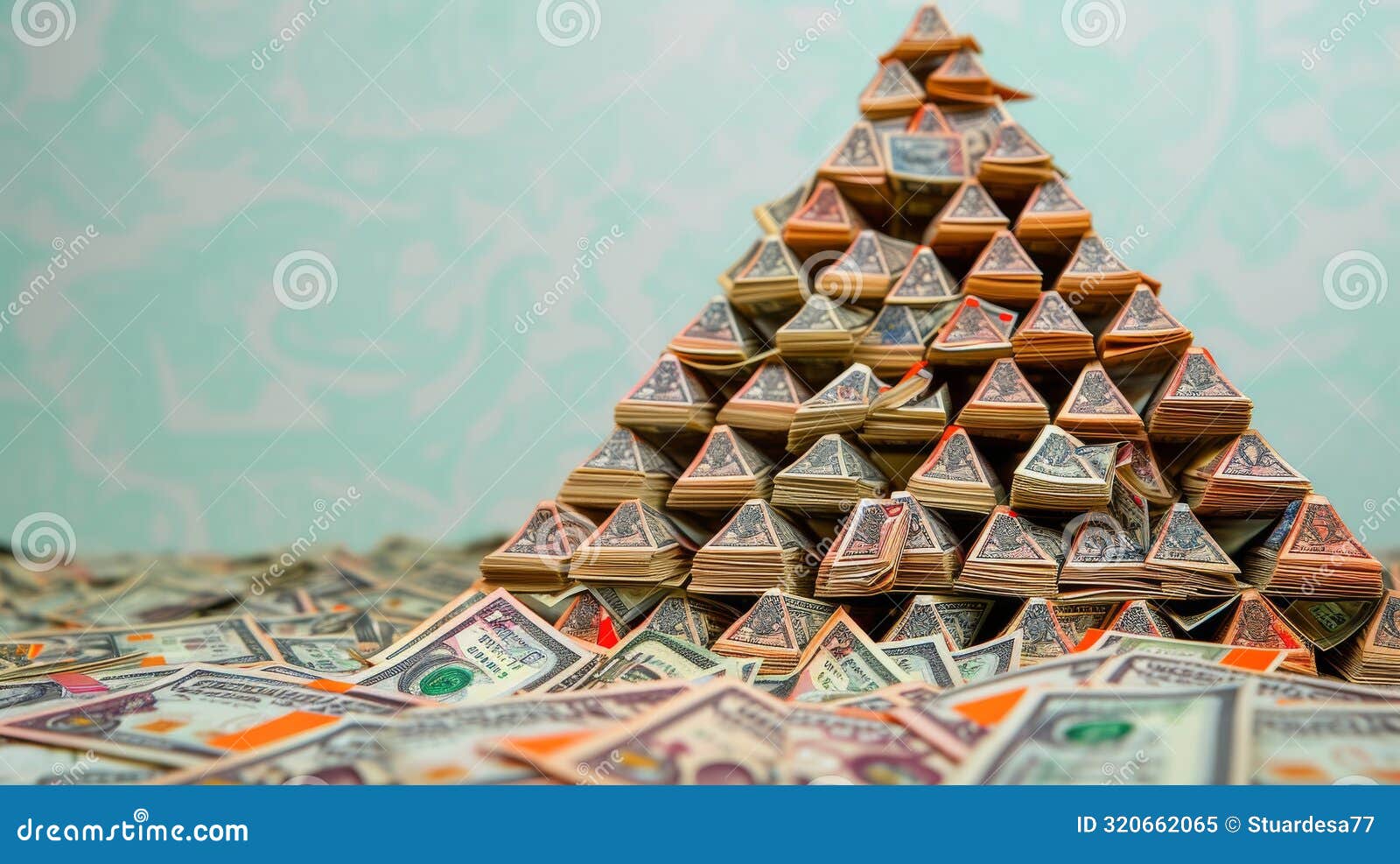 Pyramid of Stacked Dollar Bills on Scattered Cash Background Stock ...