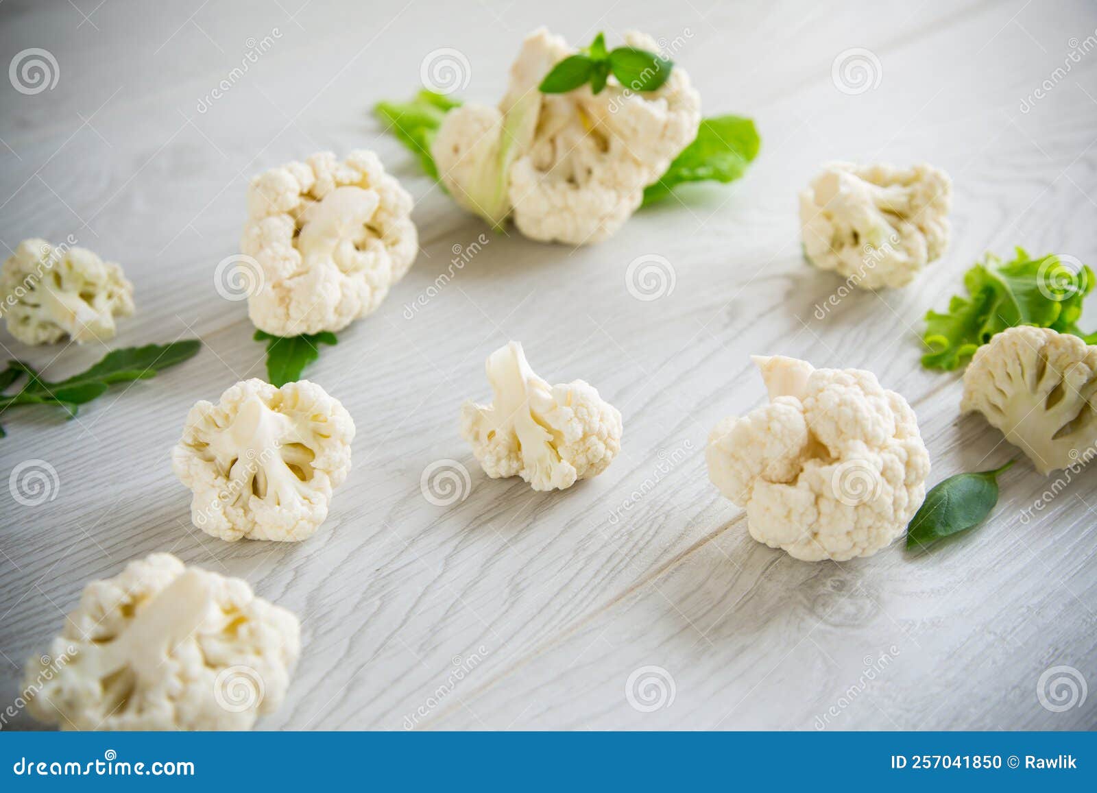 Inflorescences of Small Cauliflower on a Light Wooden Table Stock Photo ...