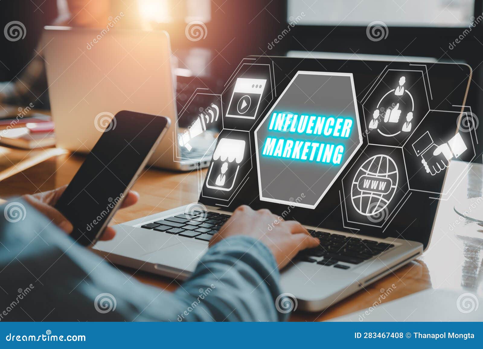 Person Working on Laptop Computer with Influencer Marketing Icon on ...