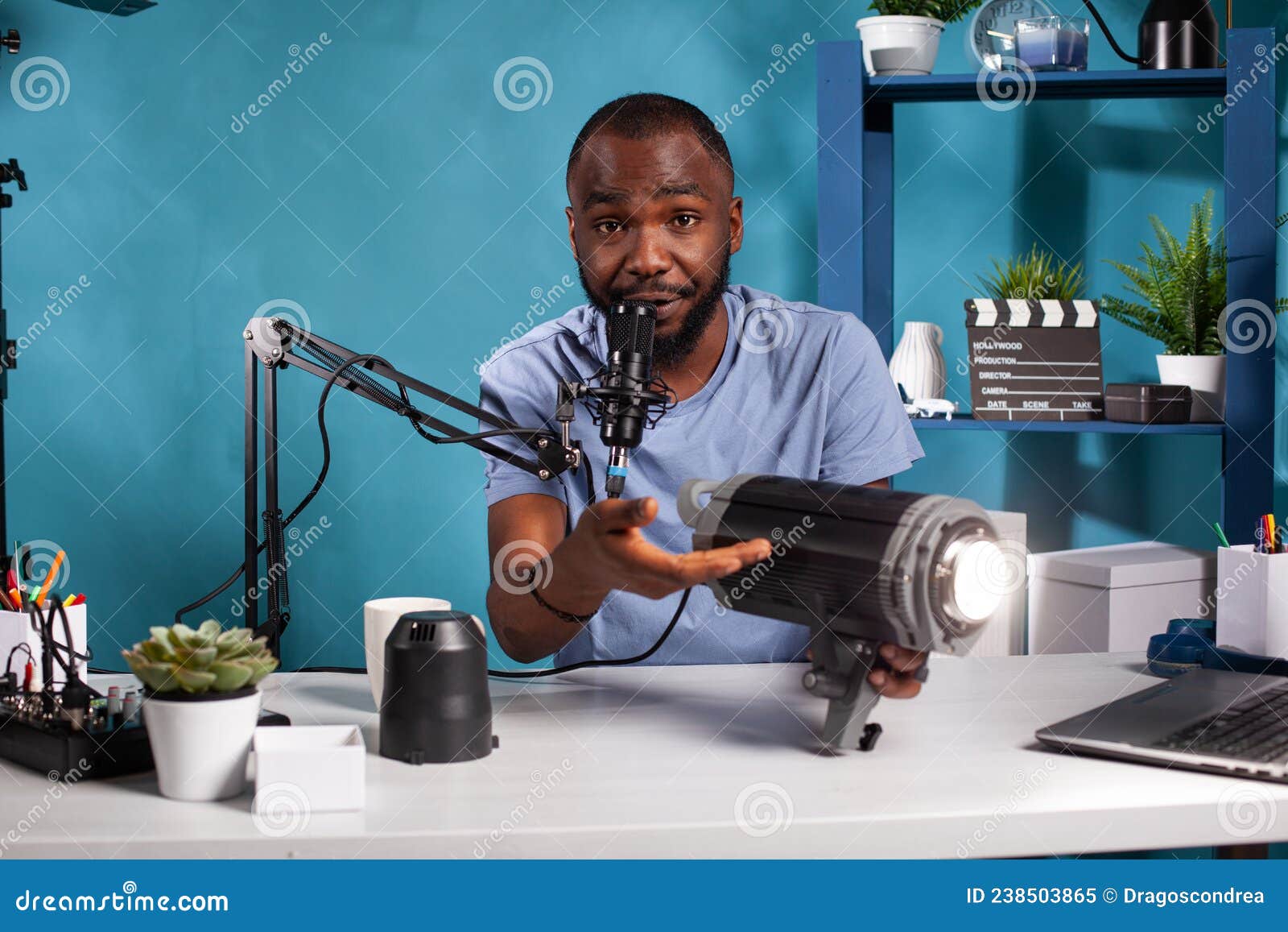 Influencer Talking into Microphone about Continous Lighting Equipment ...