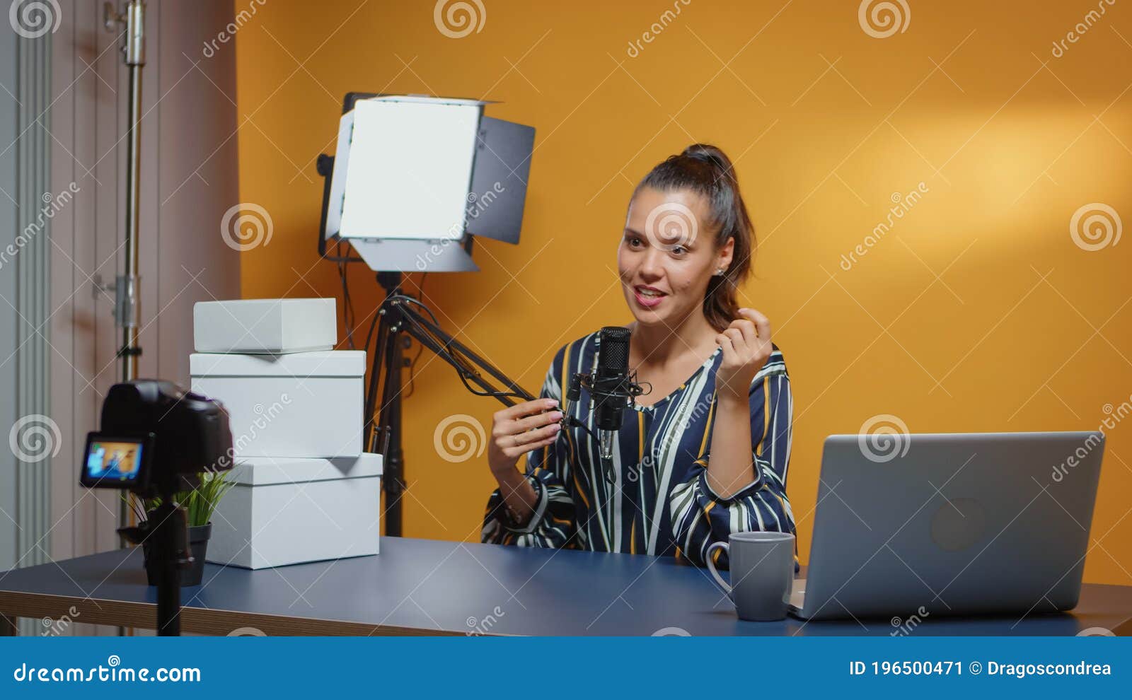 Influencer Talking To Camera and Giveaway Boxes are on the Desk Stock ...