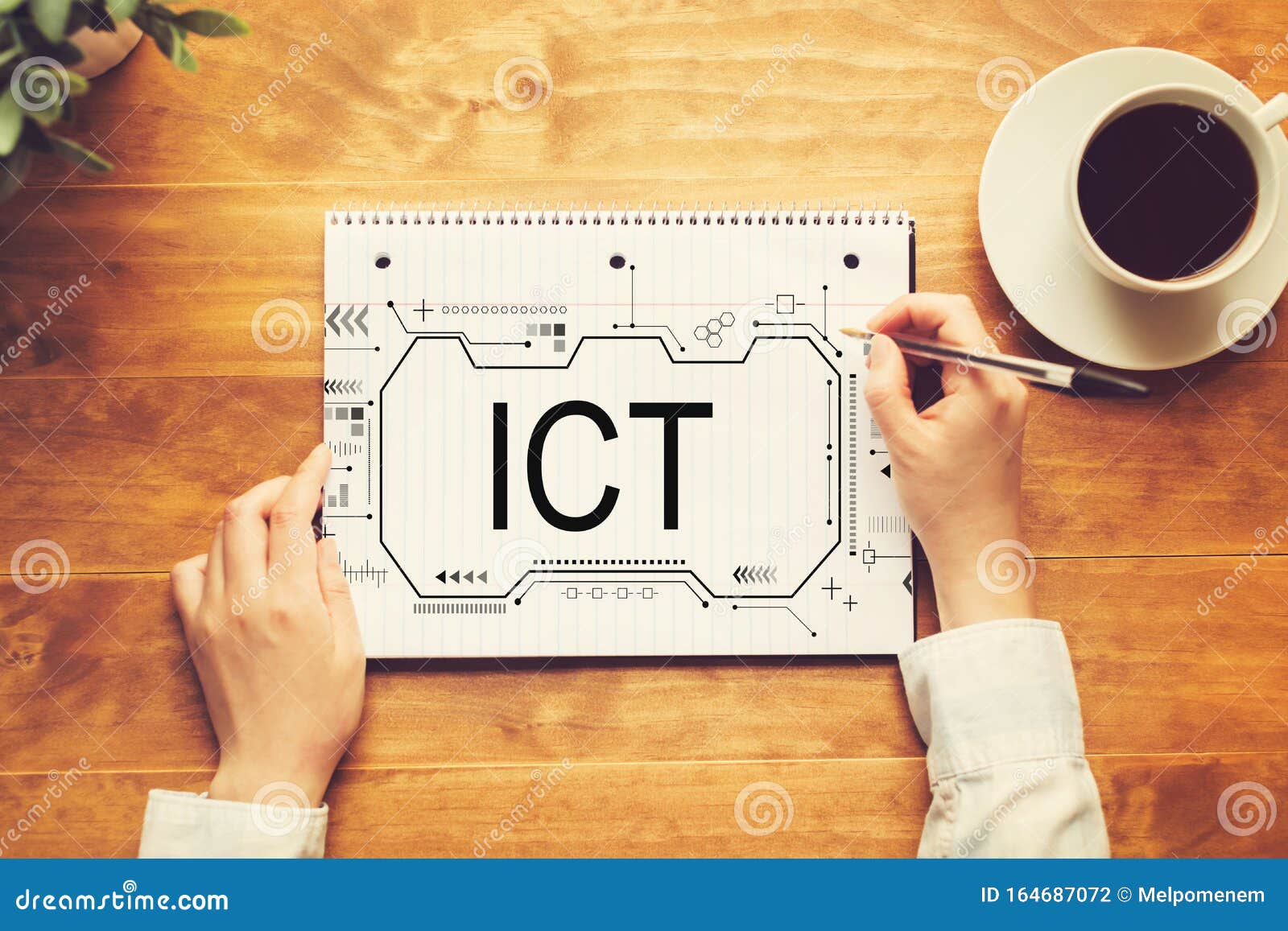 Information and Communications Technology with a Person Writing in a ...