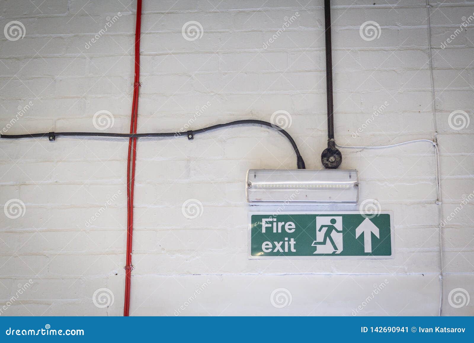 Information Plate for Emergency Exit during Fire. Stock Image - Image ...