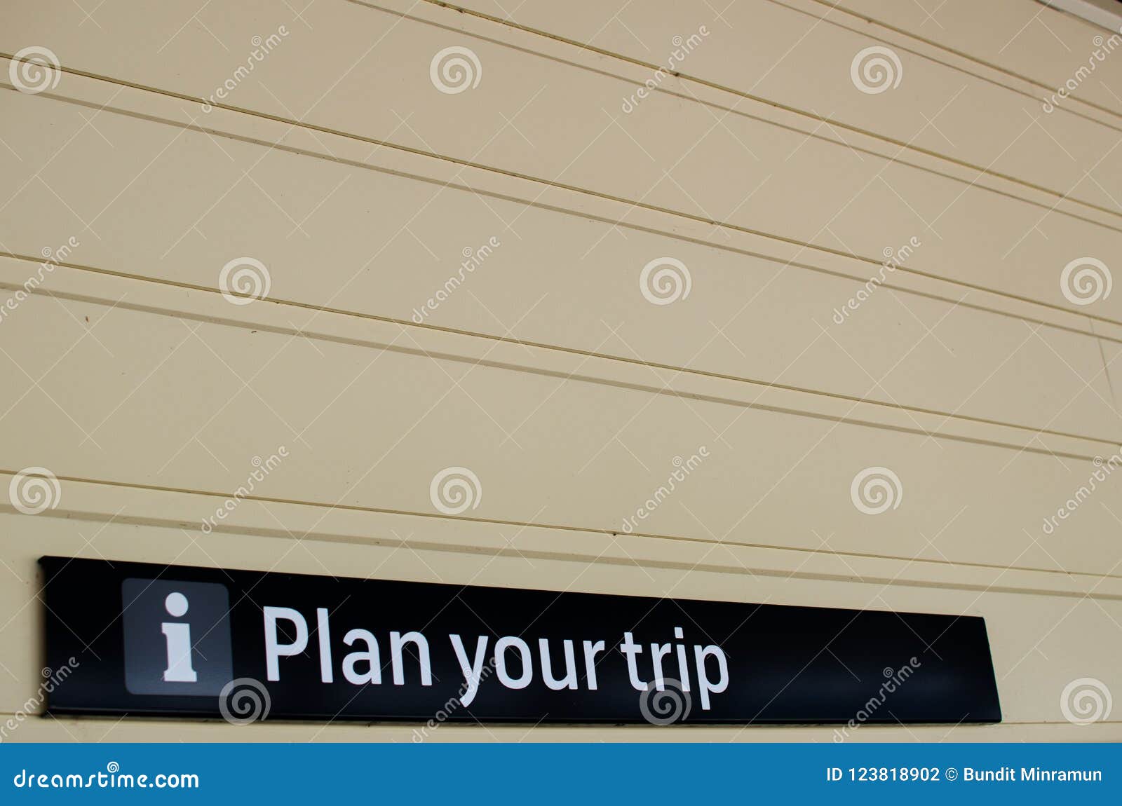 Information Sign `Plan Your Trip` on the White Wall. Stock Photo ...