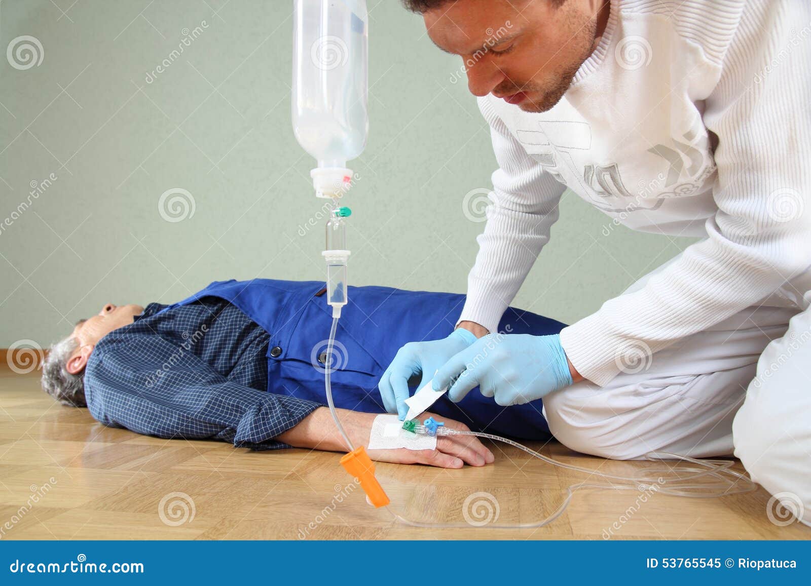Infusion of a Patient by a Paramedic Stock Image - Image of ...