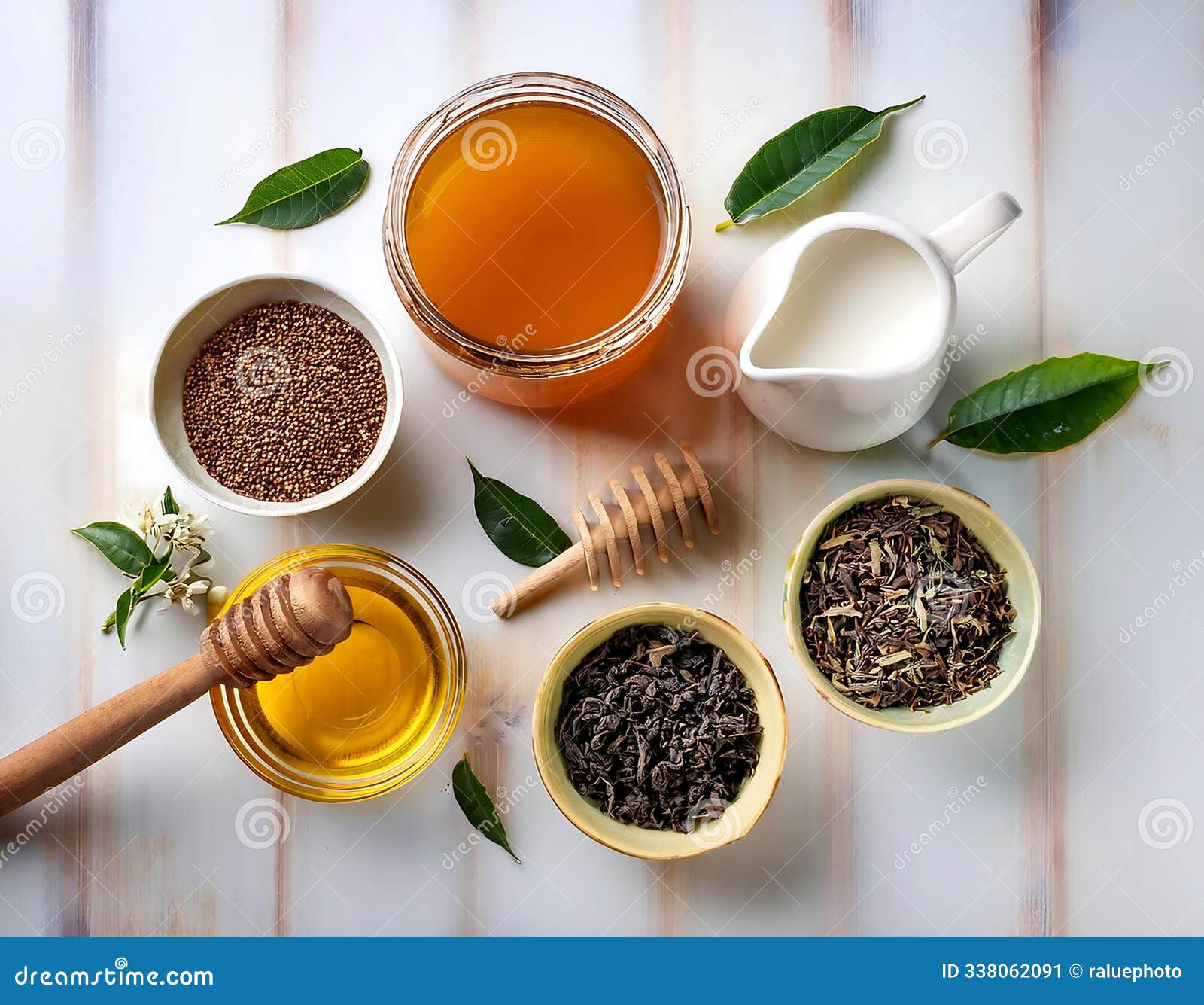 Ingredients for a Beverage, Including Milk, Tea Leaves, and Honey Stock ...