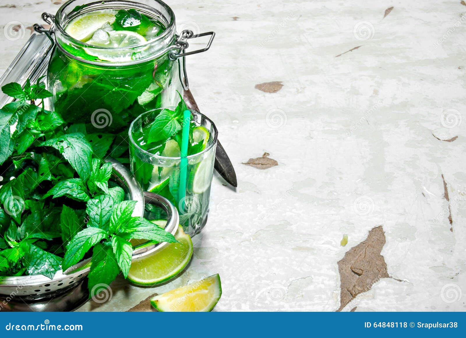 Ingredients For Making Mojitos Lime Mint Leaves Rum Citrus Knife And An Old Table Stock