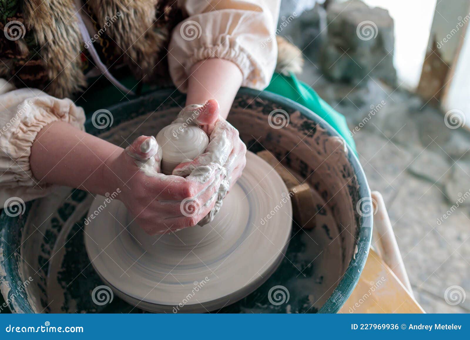 The Initial Process of Working with Clay on a Potter`s Wheel Stock ...
