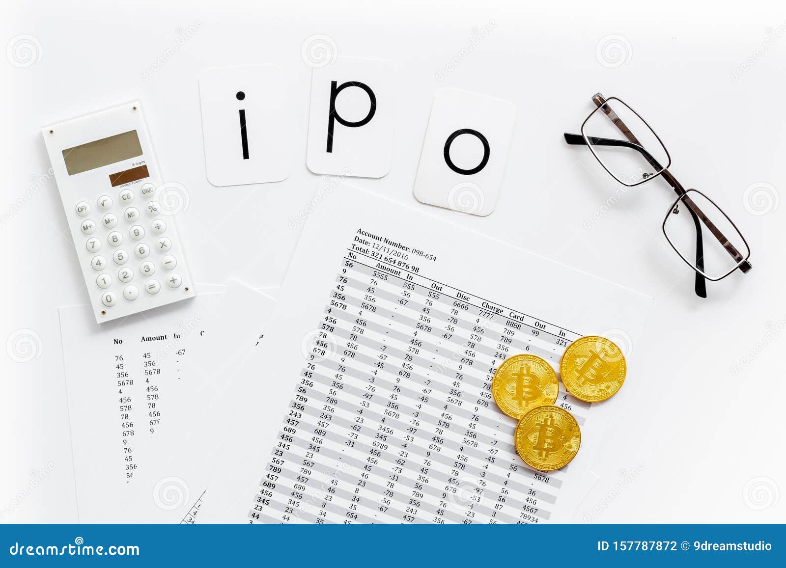 IPO with Coins and Calculation Table on Office Desk White Background ...