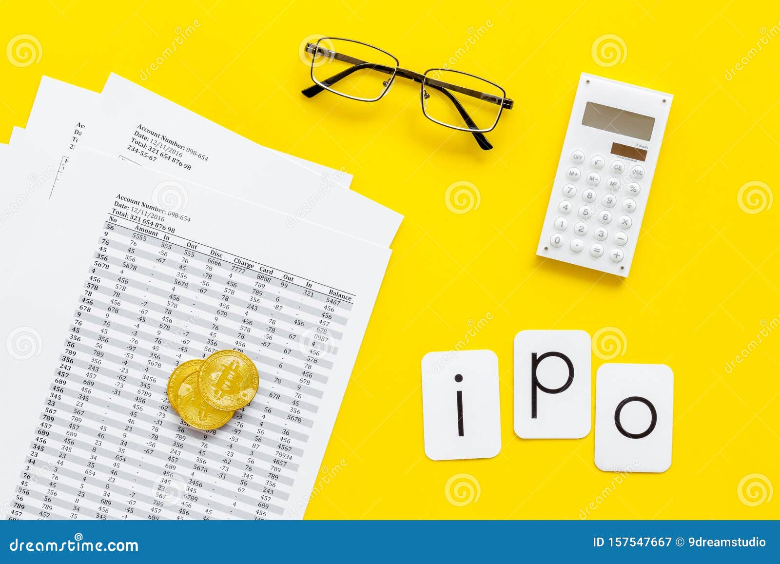 IPO with Coins and Calculation Table on Office Desk Yellow Background ...