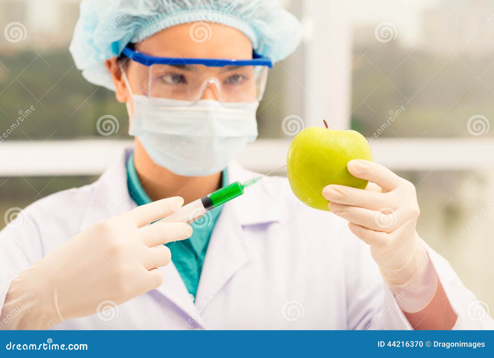 Injecting apple stock photo. Image of biotech, biology - 44216370