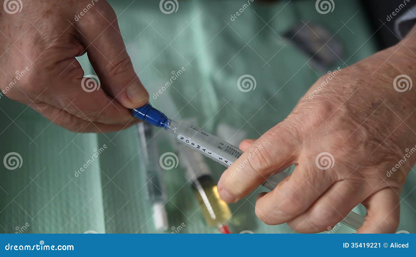Injecting Saline Solution into IV Stock Footage - Video of care ...