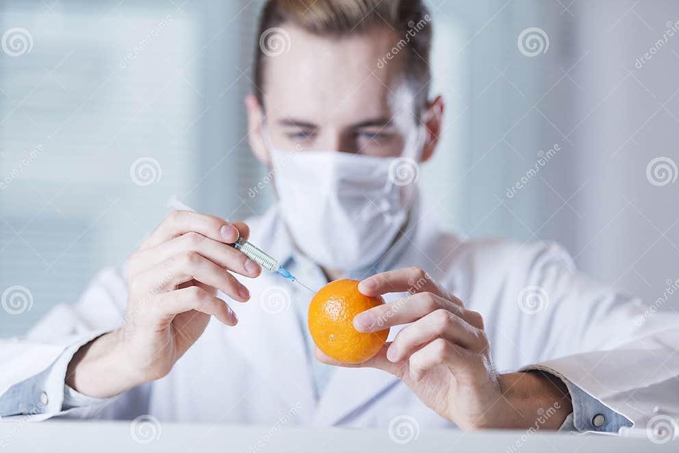 Injection in Mandarin stock image. Image of medical, fruit - 88717707