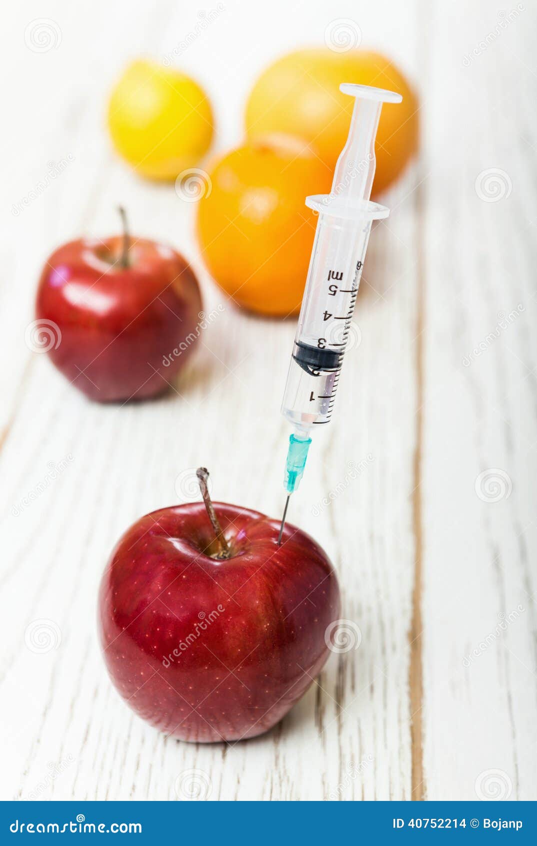 Injection into red apple stock photo. Image of healthy - 40752214