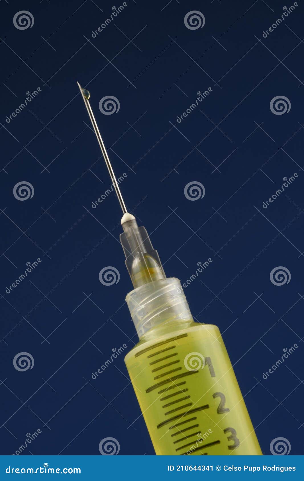 Injection Syringe with Needle Detail on Colored Background Stock Image ...