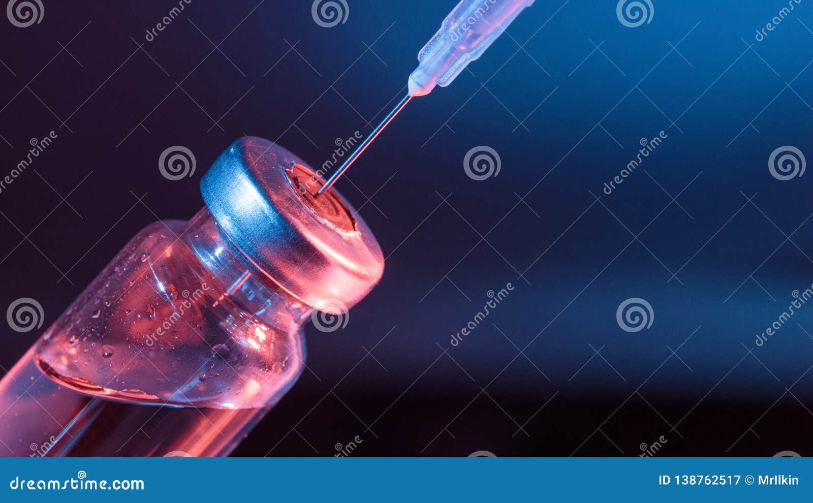 Injection Vial with Syringe Needle on Blue Background Stock Image ...