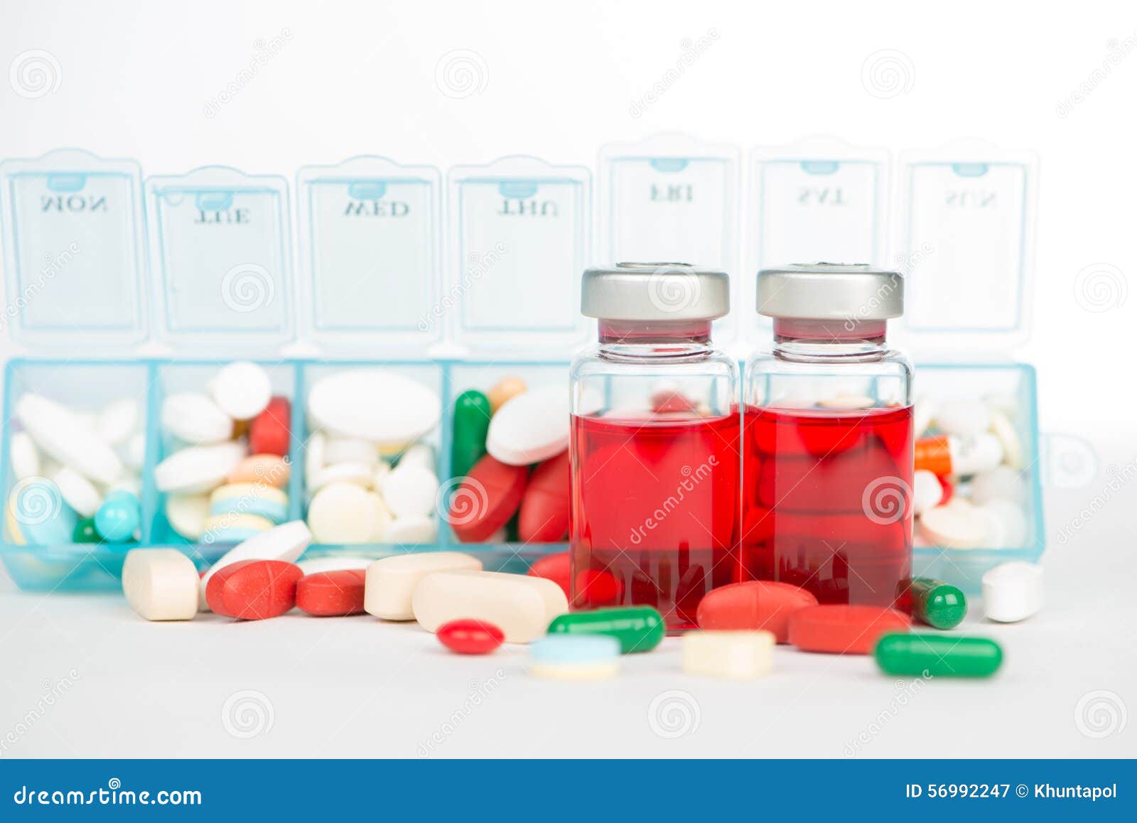 Injection Vials and Medicine in Weekly Pill Box Stock Image - Image of ...