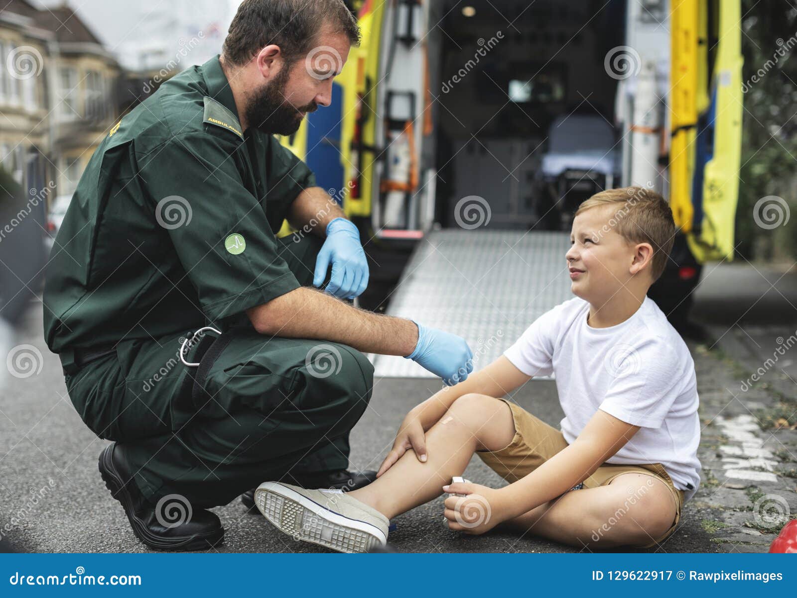 Injured Boy Getting Help from Paramedics Stock Image - Image of ride ...