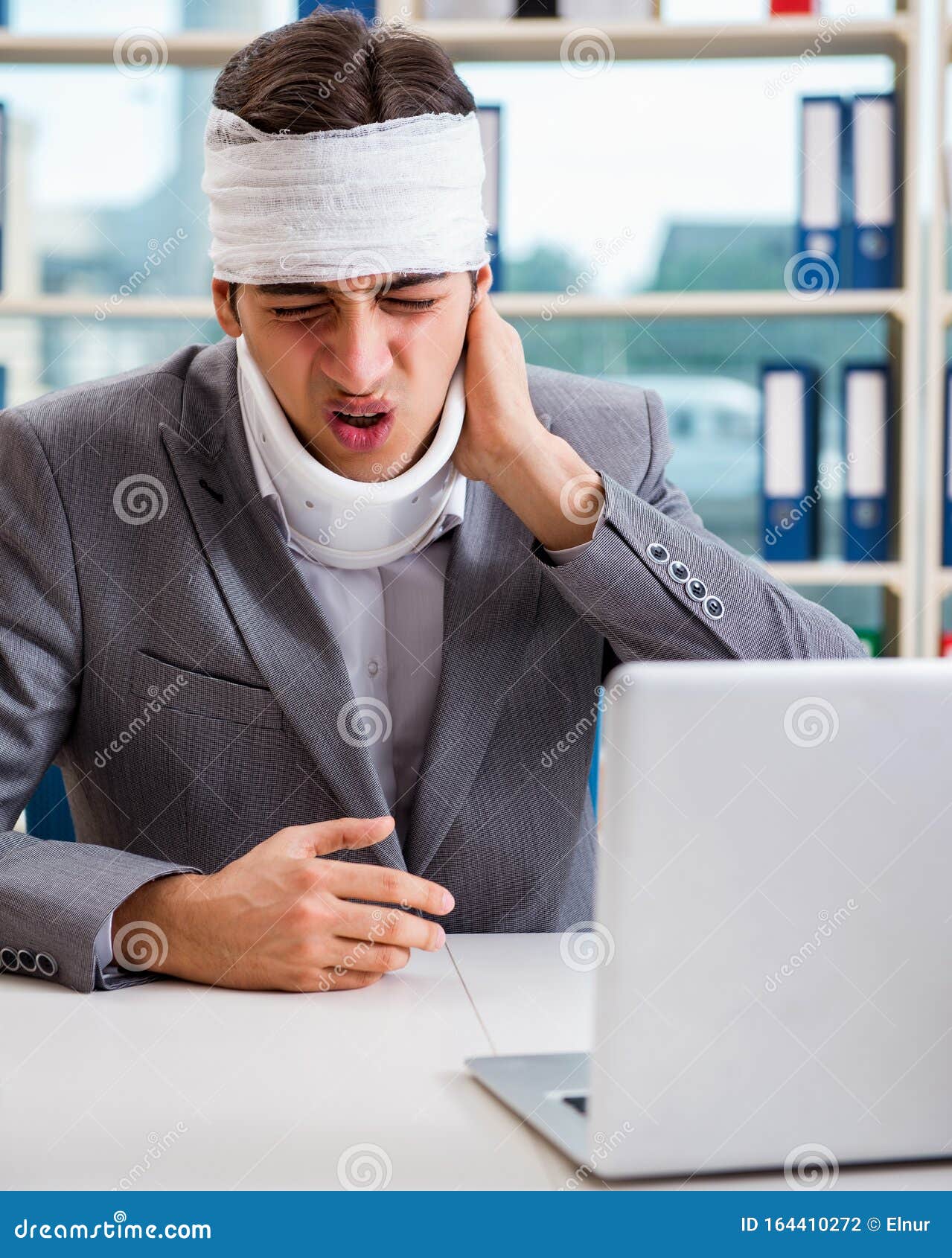 Injured Businessman Working in the Office Stock Photo - Image of neck ...