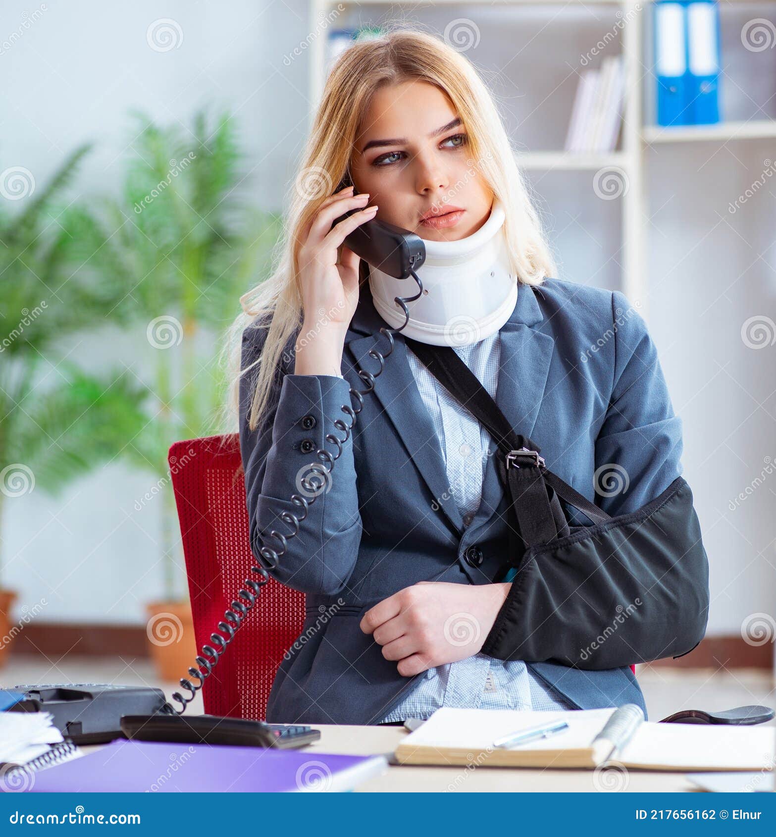 Injured Female Employee Working in the Office Stock Photo - Image of ...