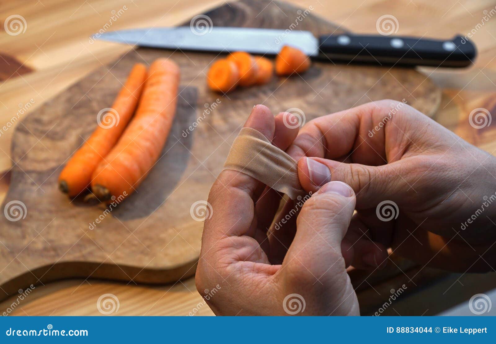 Injured in the Kitchen while Cooking Stock Photo - Image of hurt ...