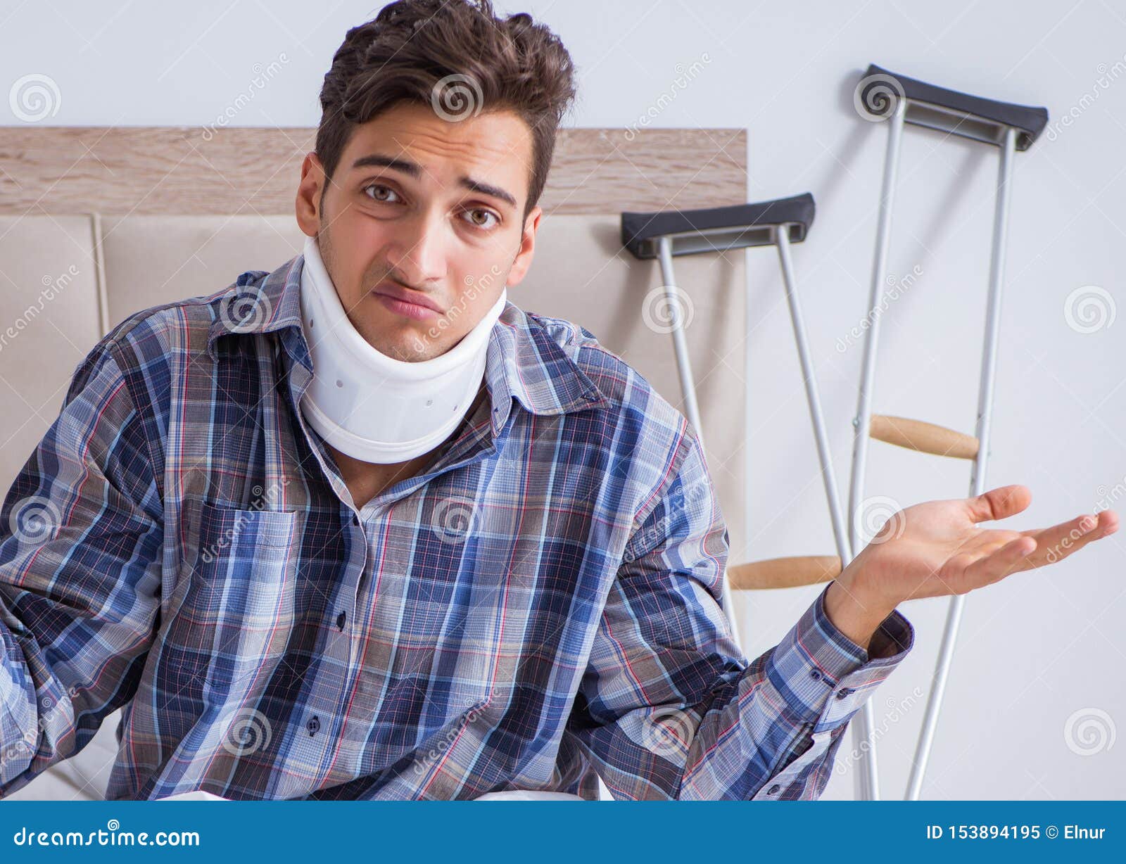 Injured Man in Bed at Home with Crutches Stock Image - Image of medical ...