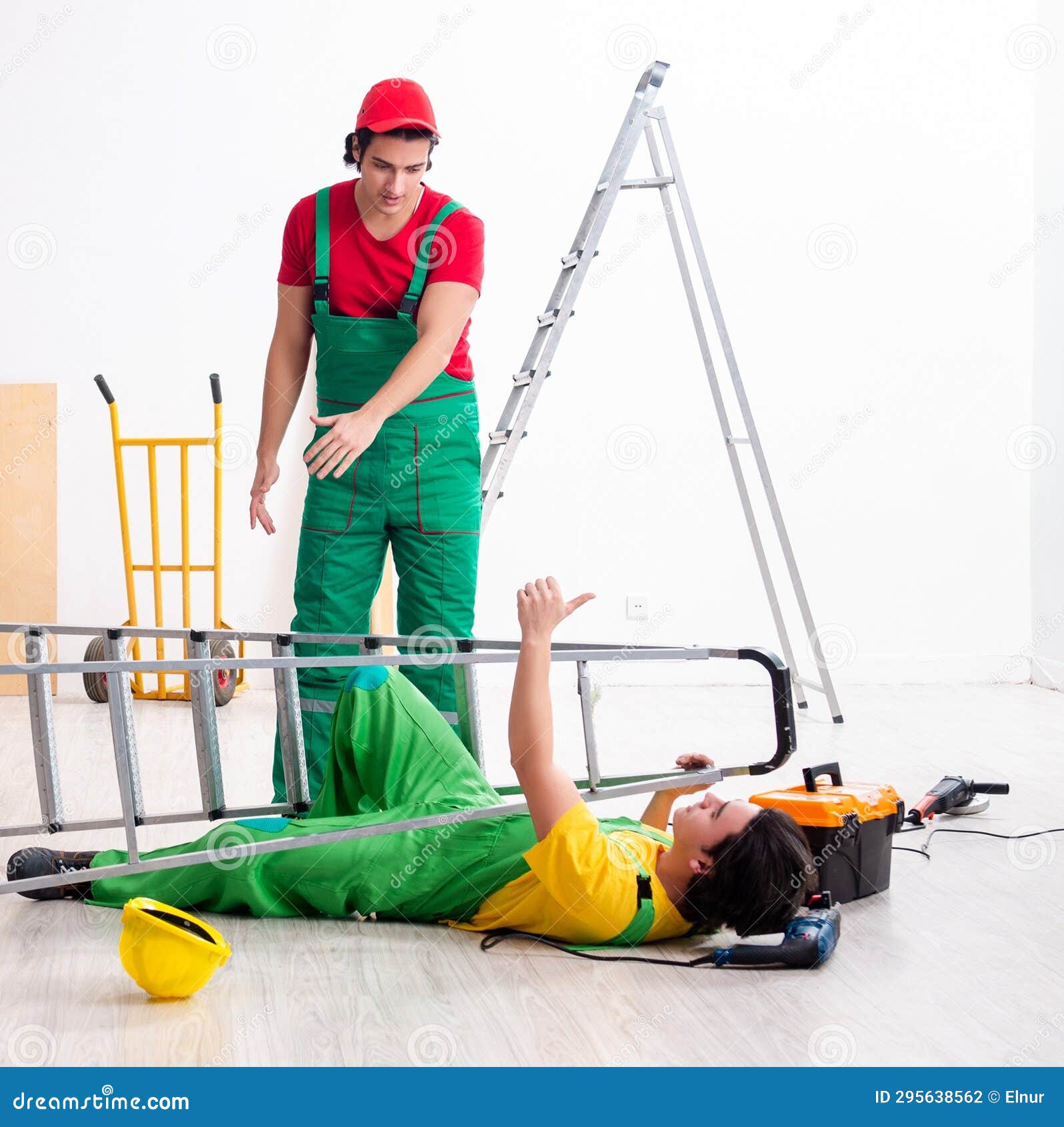 Injured Worker and His Workmate Stock Photo - Image of injury, falling ...