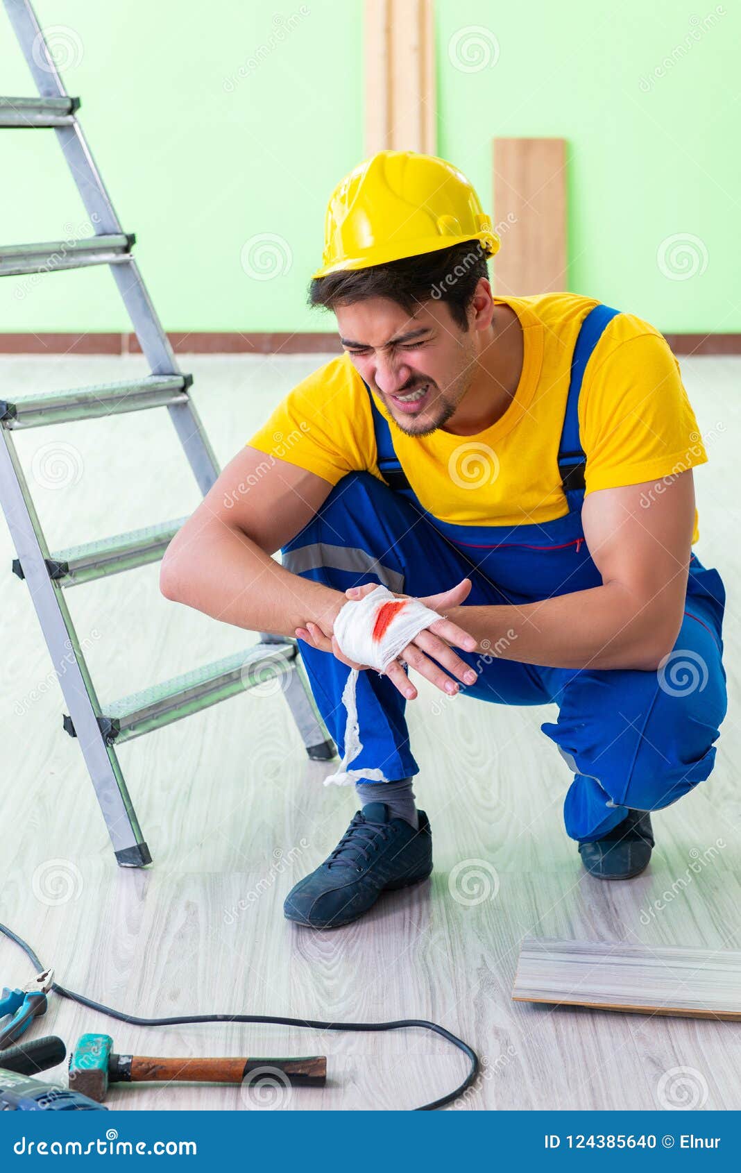 The Injured Worker at the Work Site Stock Photo - Image of accident ...