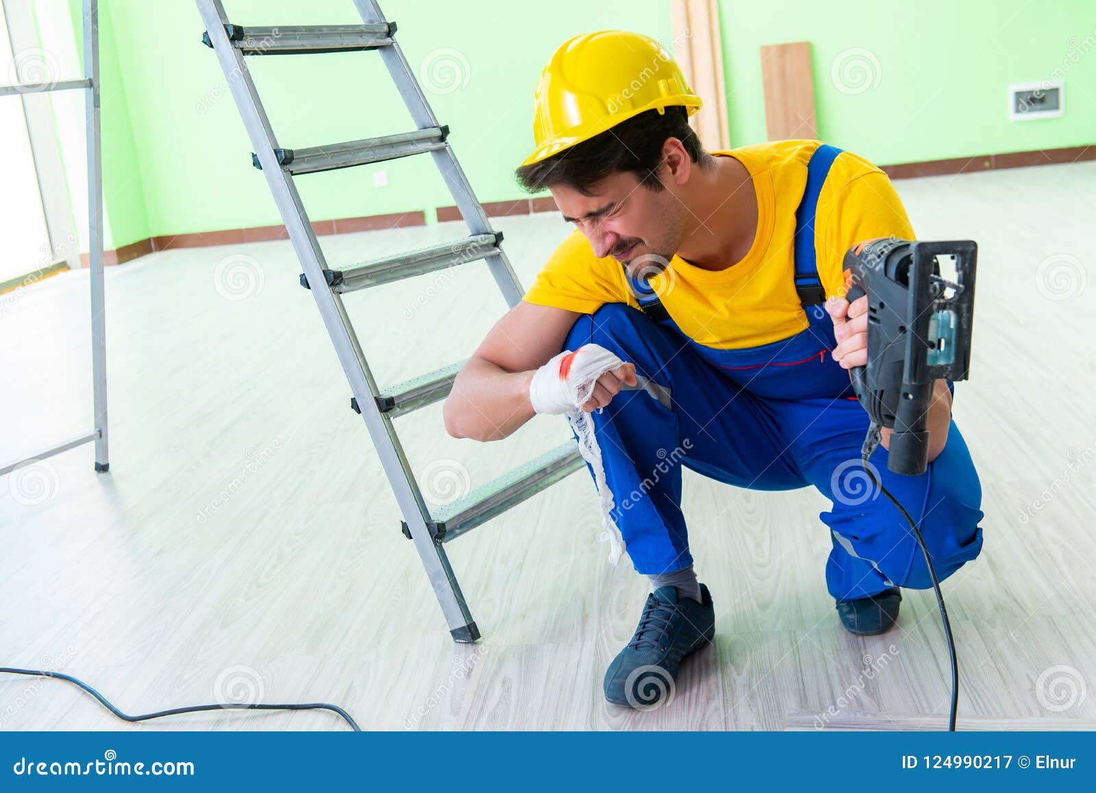 The Injured Worker at the Work Site Stock Image - Image of injured ...