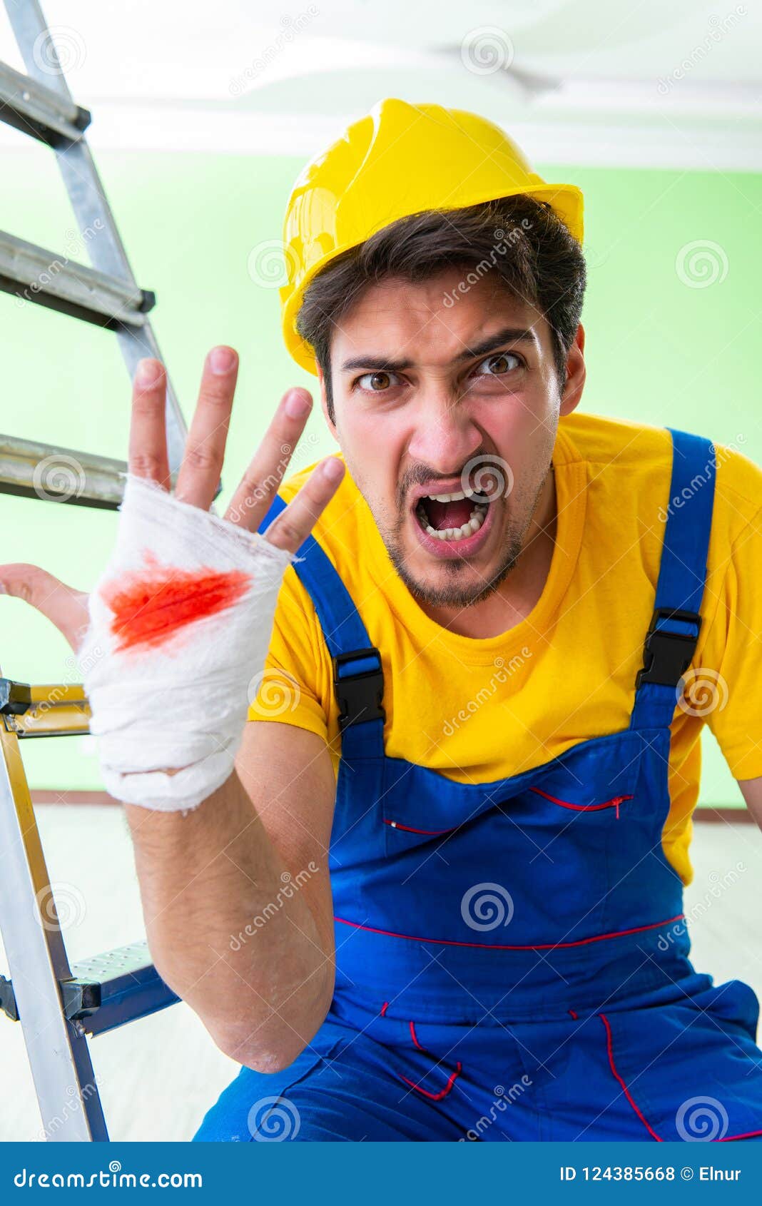 The Injured Worker at the Work Site Stock Photo - Image of frustrated ...
