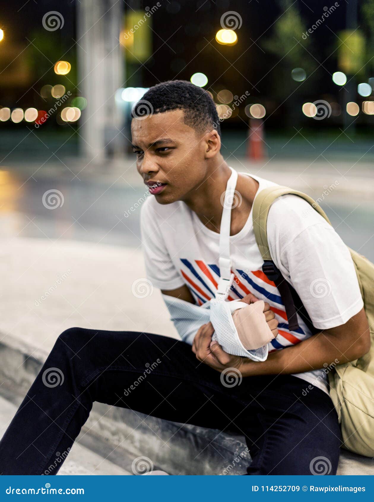 Injured Young Man with Arm Support Stock Image - Image of person ...