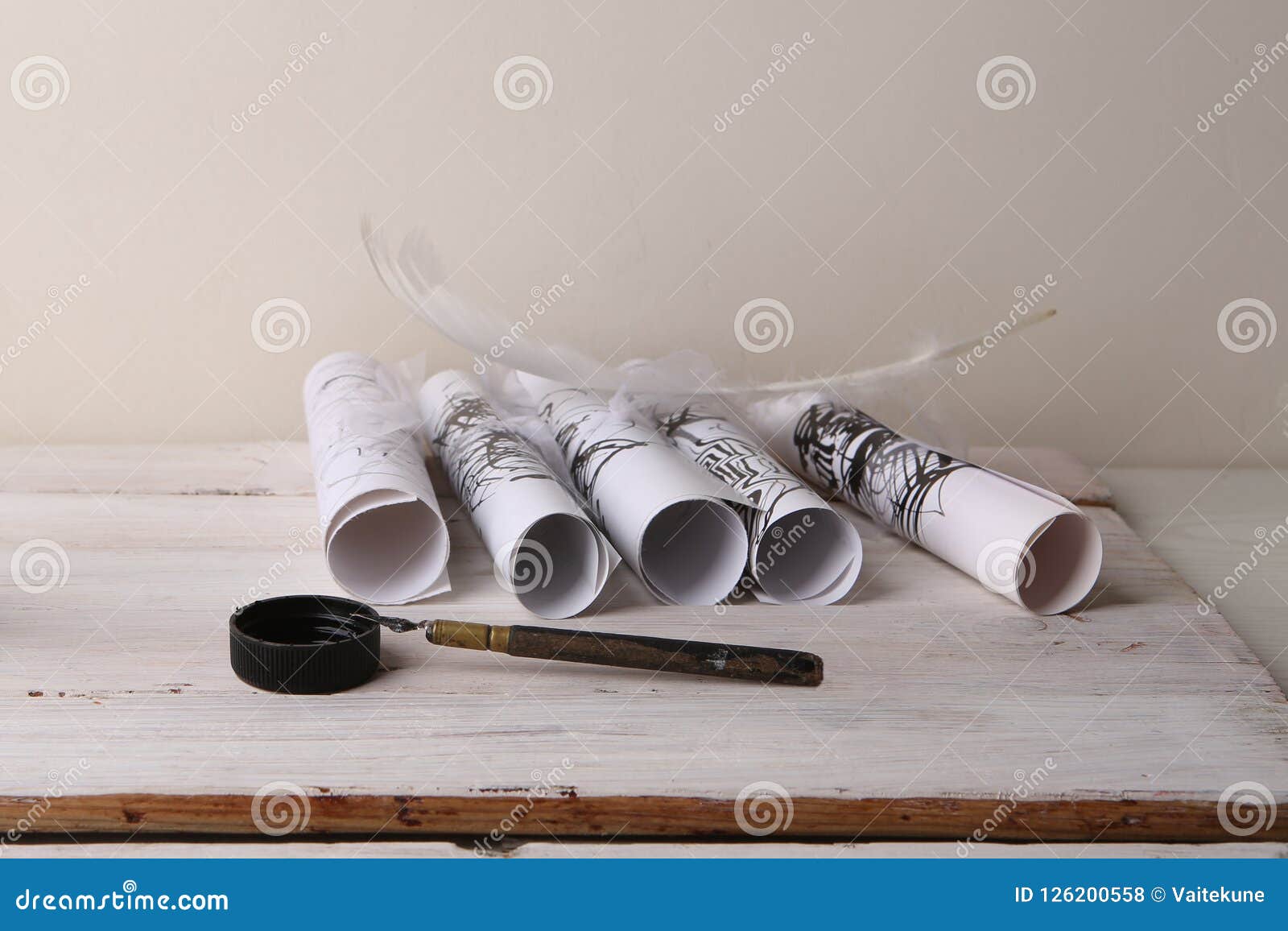 Ink Pen and Paper Rollers with Ink Drawing of Graphic, Calligraphy ...