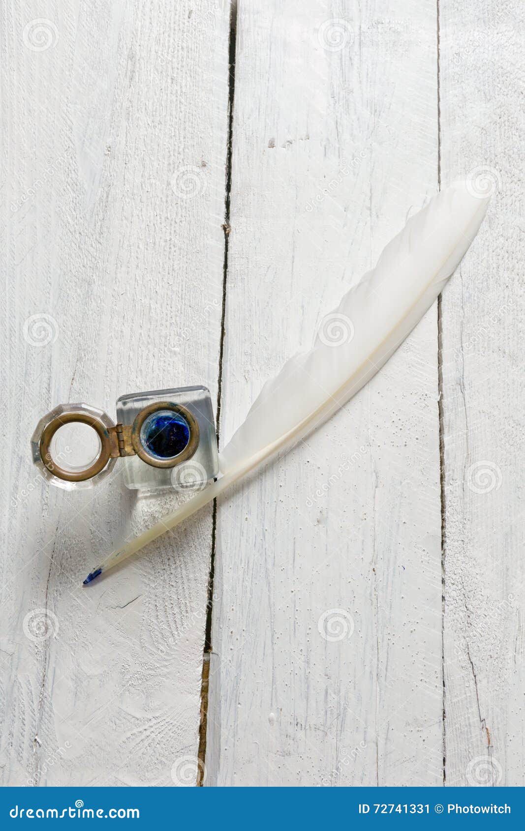 Inkpot and quill on table stock image. Image of space - 72741331