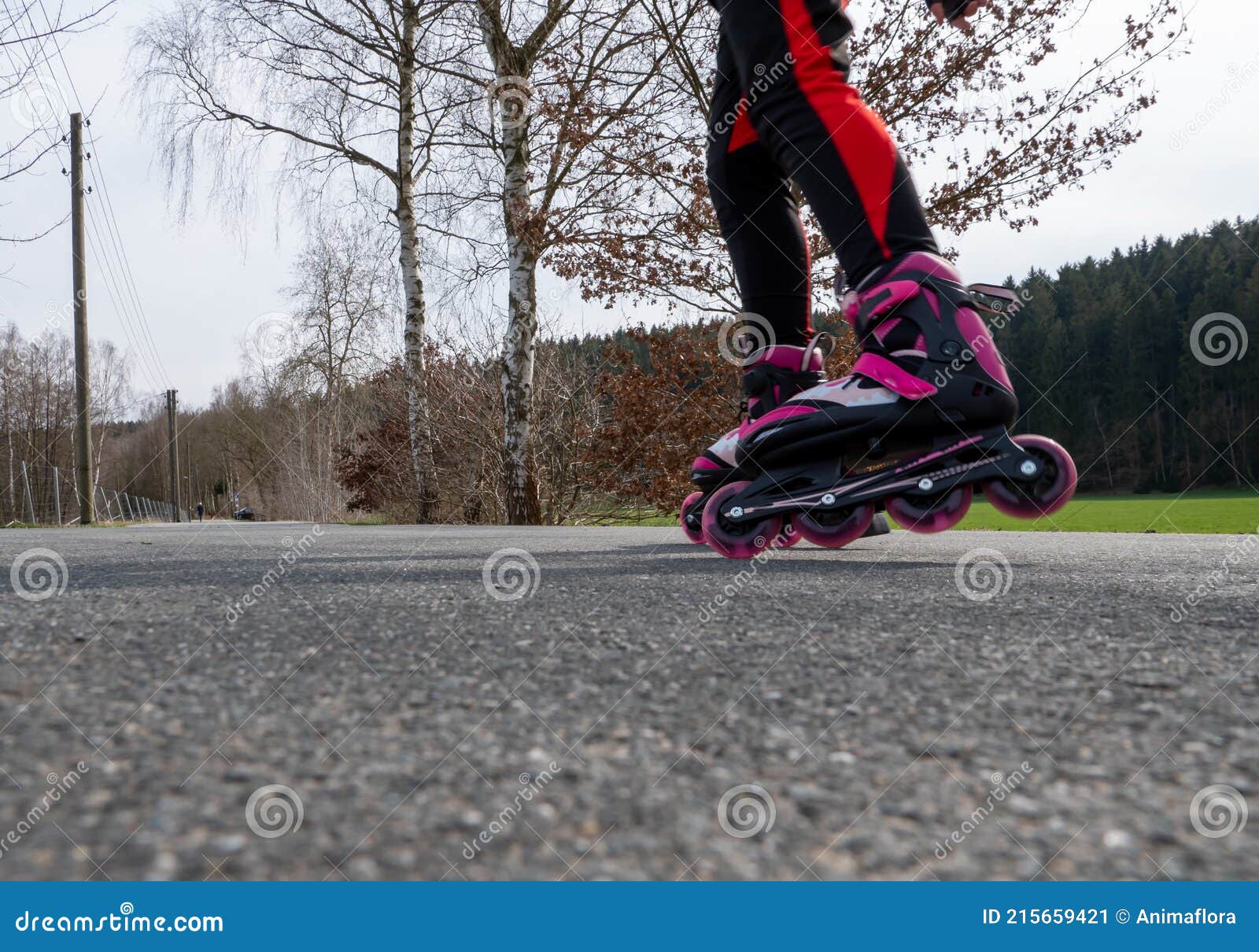 Inline skating on a street stock image. Image of condition - 215659421
