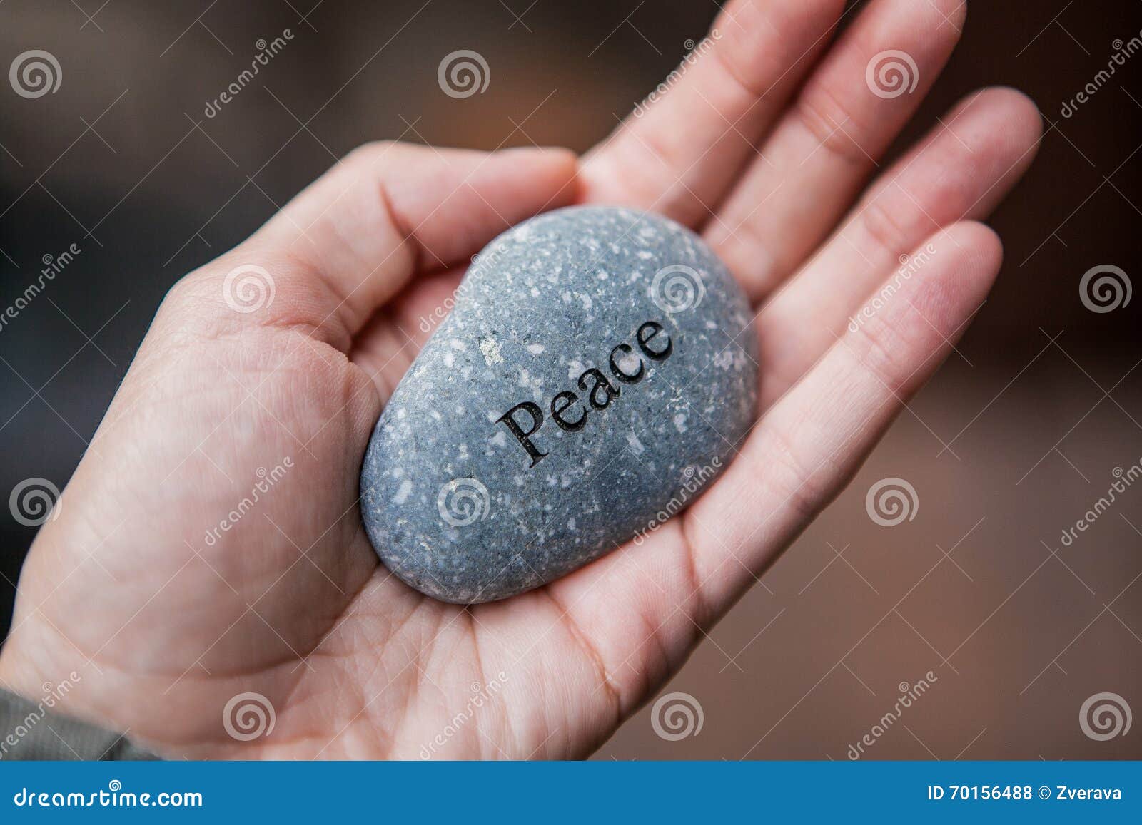 Inner Balance Concept: Hands Holding Stones with the Word Peace Stock ...
